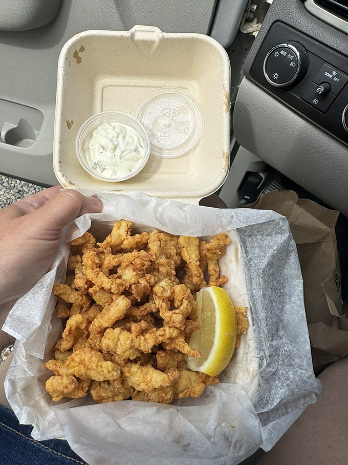 Fried clam strips to-go&mdash;the ultimate car snack that makes drive-thru food seem like punishment. Worth every napkin you'll need.