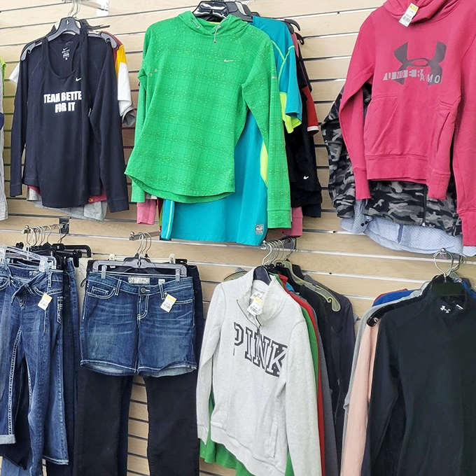 Nike, Under Armour, and Victoria's Secret Pink all hanging together in secondhand harmony – fashion democracy at its finest.