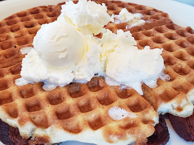This golden waffle topped with vanilla ice cream proves that sometimes the best breakfast is actually dessert in disguise.