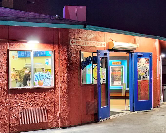 This coral-colored concession building has witnessed generations of moviegoers debating the eternal question: candy or popcorn? (The correct answer: both.)