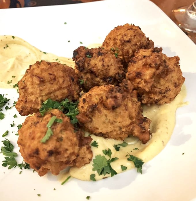 Conch fritters that could make a Bahamian chef nod in approval. Crispy exterior, tender inside, and that sauce&mdash;oh, that sauce!