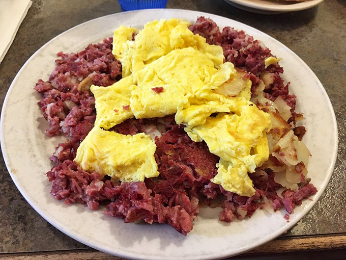 Corned beef hash that doesn't hide in a can, topped with eggs that look like they were laid this morning. This is breakfast with integrity.