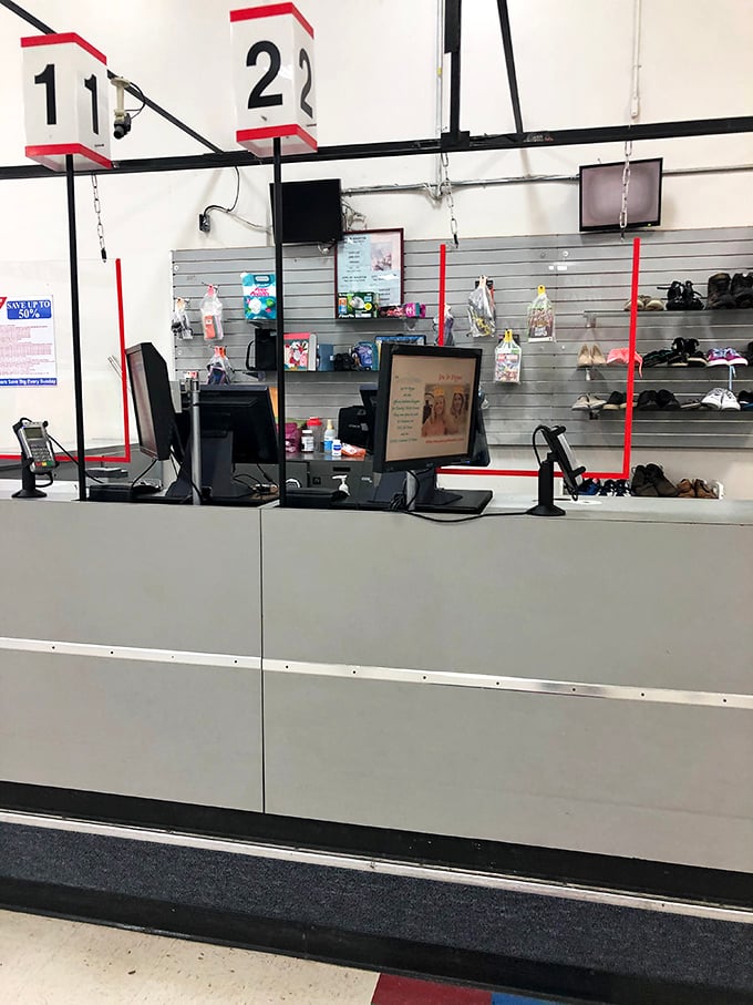 Numbered checkout stations keep order in a universe where chaos of merchandise reigns supreme elsewhere in the store.