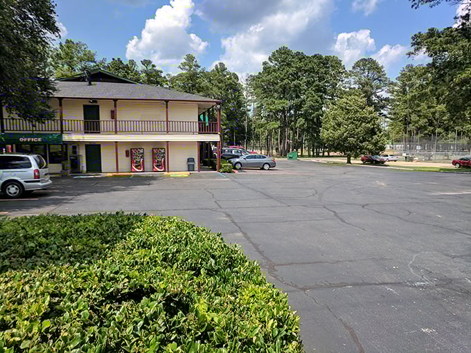 The Country Inn has that quintessential roadside charm that makes you wonder if the pancakes inside are as perfectly nostalgic as the building itself.