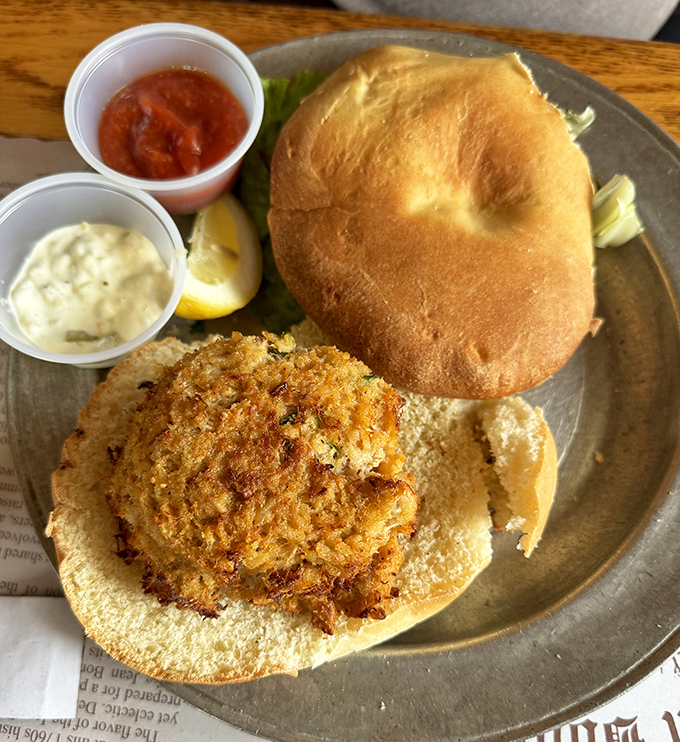 The crab cake sandwich here contains more actual crab than most oceanside restaurants. Golden-brown perfection that Maryland would approve of.