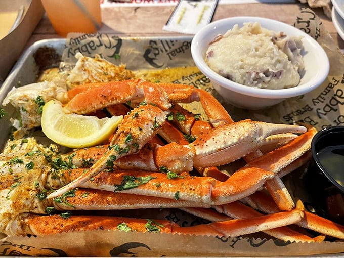 Snow crab legs arranged like nature's perfect finger food – the kind that justifies wearing a bib in public without a hint of embarrassment.