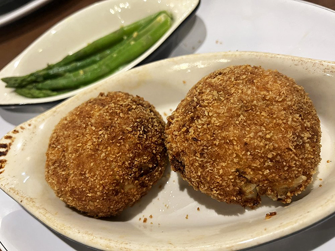 Golden-brown crab cakes that could make a Marylander weep with joy. Crispy outside, tender inside&mdash;the way nature intended.