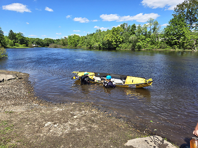 Summer in Maine means getting on the water. This peaceful river scene captures the simple joy of floating through nature's cathedral.