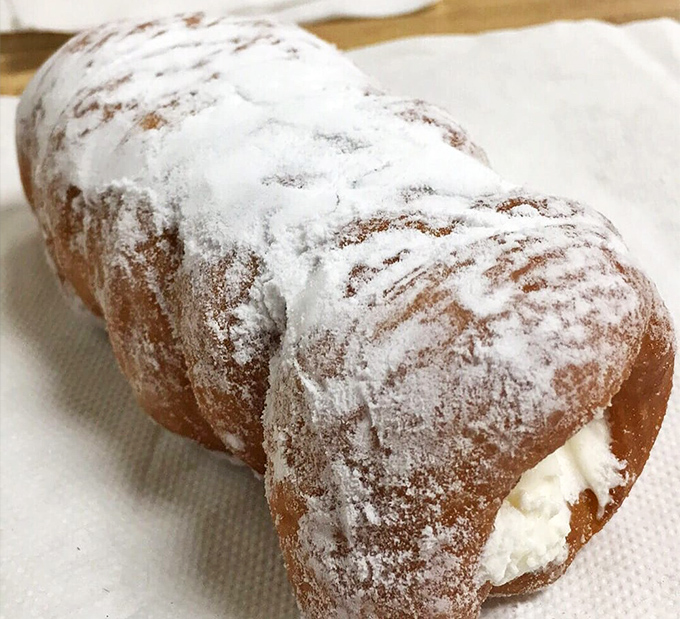 The cream horn—a powdered sugar-dusted miracle that makes you wonder why you ever wasted time on lesser desserts.