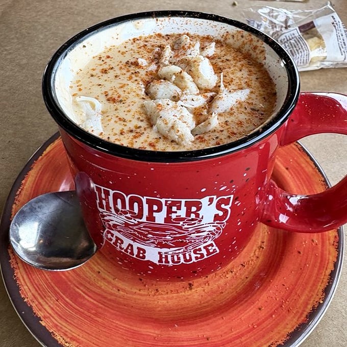 Cream of crab soup served in a mug the size of your ambitions. Speckled with Old Bay like stars in a creamy galaxy.