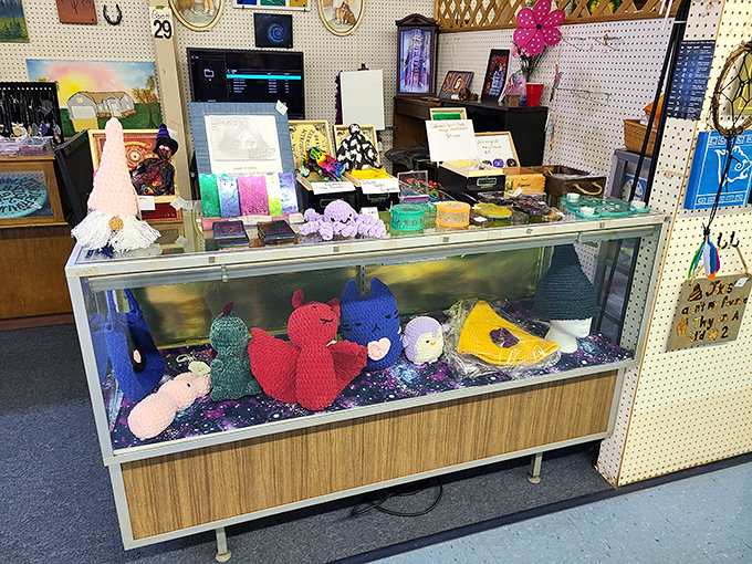 Handcrafted crochet creatures swimming in a sea of sparkly purple. Proof that someone's grandmother has been very busy and very creative.
