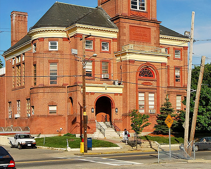 Cumberland Town Hall stands as a brick testament to civic pride, where government happens in surroundings worthy of a Wes Anderson film.
