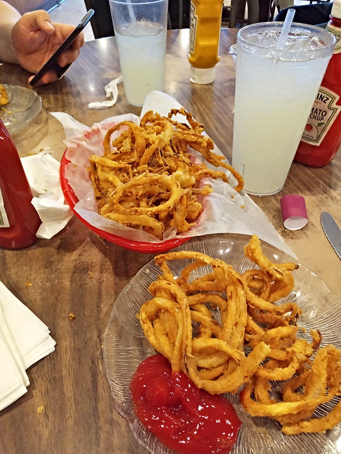 Curly fries: where engineering meets potato perfection. The spiral shape clearly creates more surface area for maximum crispiness.