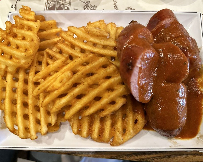 Waffle fries and sausage&mdash;a marriage so perfect it makes you wonder why anyone bothers with wedding planners. That gravy means business. 
