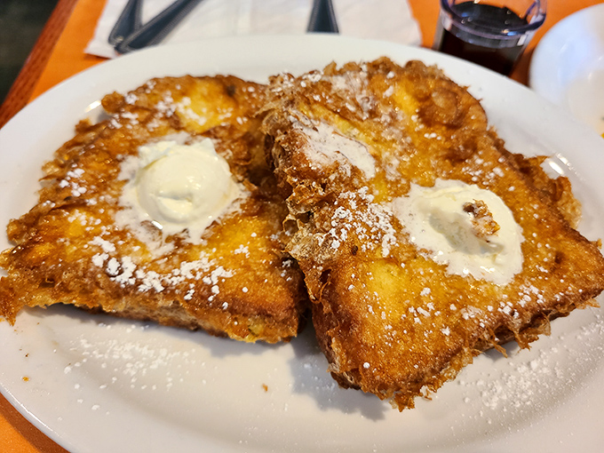 Deep-fried French toast that makes regular French toast look like it's not even trying. Those dollops of butter are melting with purpose.