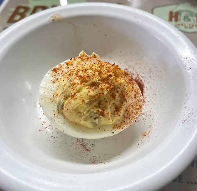 This isn't just a deviled egg; it's a masterclass in Southern appetizers, dusted with paprika and filled with creamy perfection.