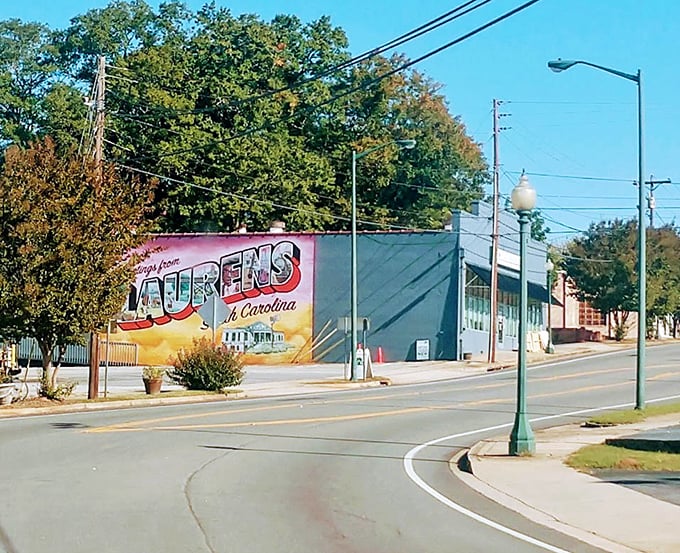 The "Greetings from Laurens" mural doesn't just welcome visitors – it's a colorful reminder that small towns know exactly who they are.