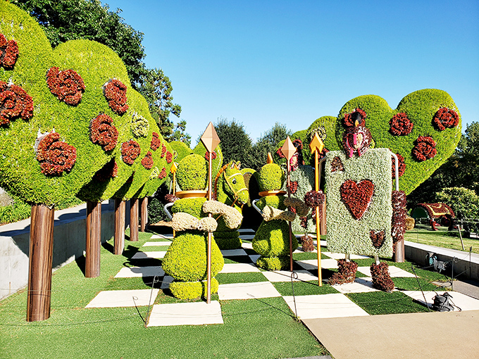 Heart-adorned topiary trees stand guard over this whimsical garden display &ndash; romance literally growing on trees.