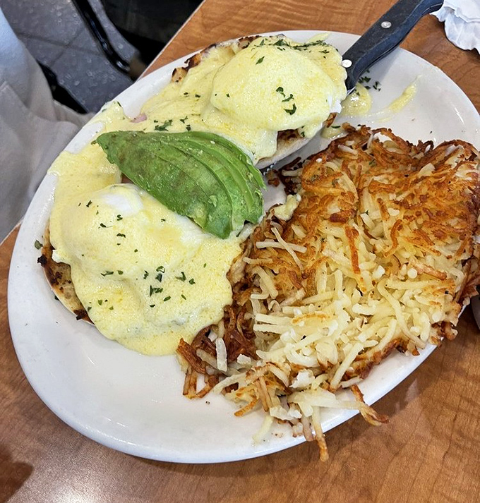 Eggs Benedict California-style, with creamy hollandaise and fresh avocado&mdash;breakfast elevated to an art form without any unnecessary pretension.