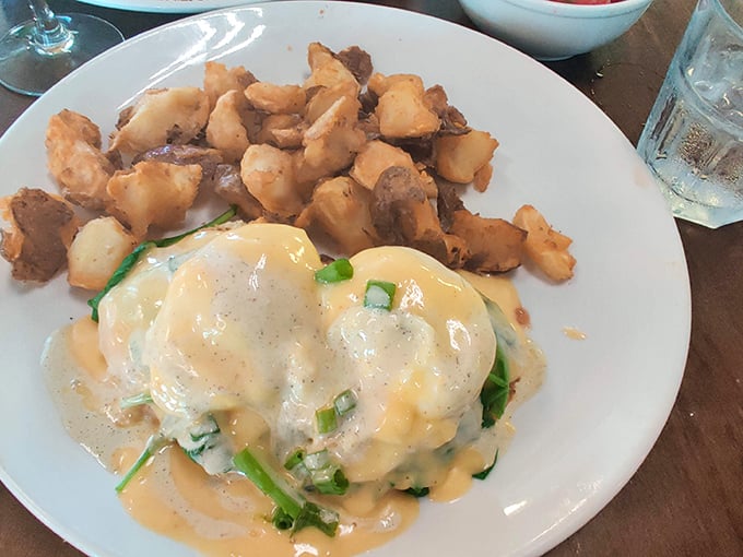 These eggs Benedict aren't just breakfast&mdash;they're an event. The hollandaise sauce cascades down like a yellow waterfall of happiness.