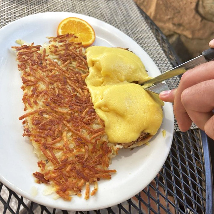 Eggs Benedict with hash browns so perfectly crisp, they make that satisfying scrape against your fork that food dreams are made of.