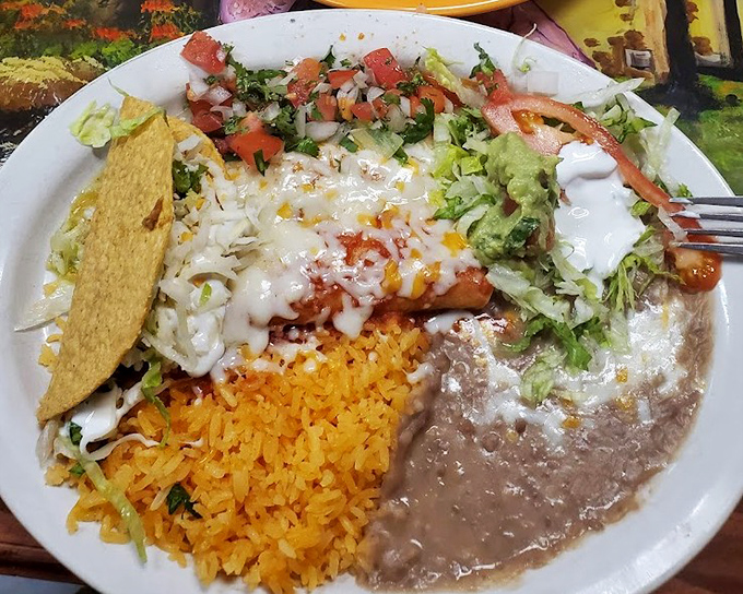 
This plate doesn't just feed your body&mdash;it feeds your soul. Enchiladas, rice, beans, and all the fixings create the comfort food trifecta. 