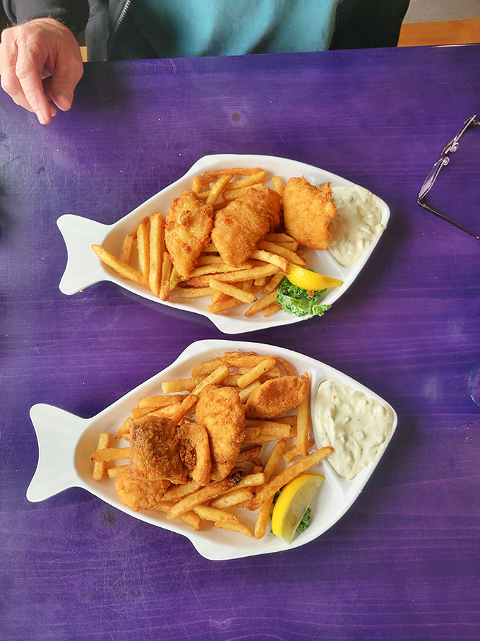 Fish and chips served on fish-shaped plates&mdash;it's like seafood inception, and exactly the kind of charming touch that makes Mo's special.