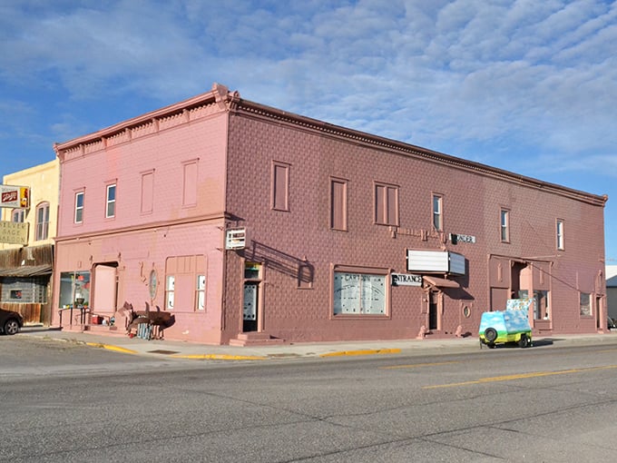 The pink brick building stands as Shoshoni's architectural elder statesman, wearing its weathered facade like badges of honor from decades past.