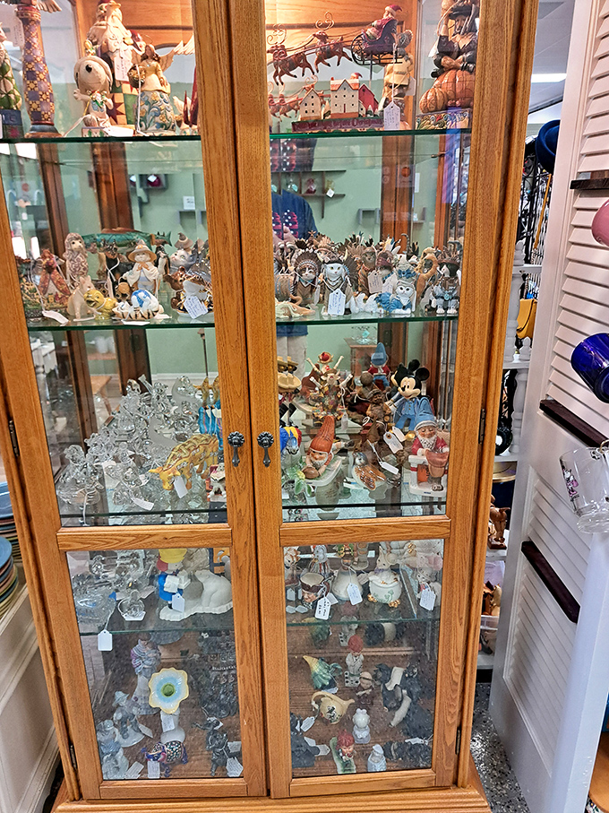 This glass cabinet is childhood distilled &ndash; figurines frozen in permanent poses, waiting for collectors to rescue them from anonymity.