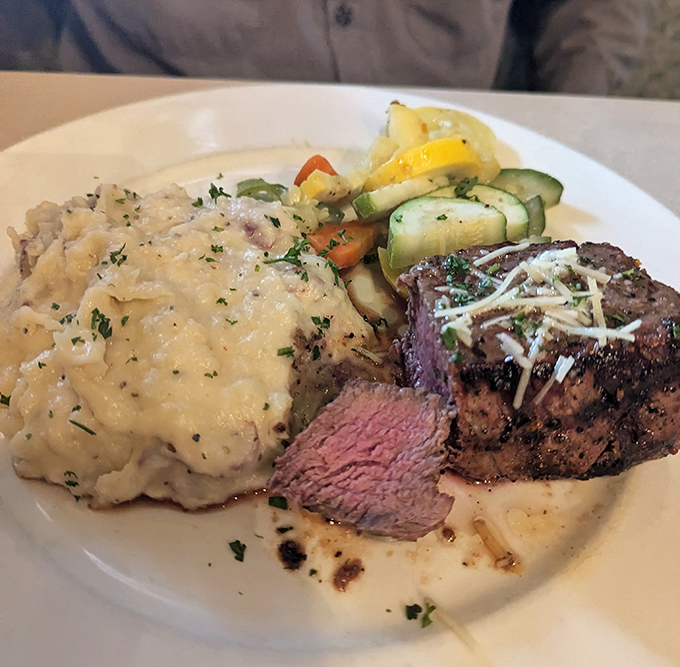 This filet mignon doesn't need fancy presentation&mdash;it lets its perfect medium-rare center do all the talking. Those mashed potatoes aren't just sidekicks; they're co-stars.