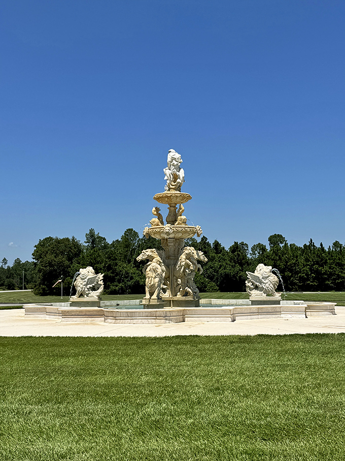 Not a dinosaur, but this elegant fountain offers a moment of classical refinement between prehistoric encounters. Even T-Rex appreciates good landscaping.