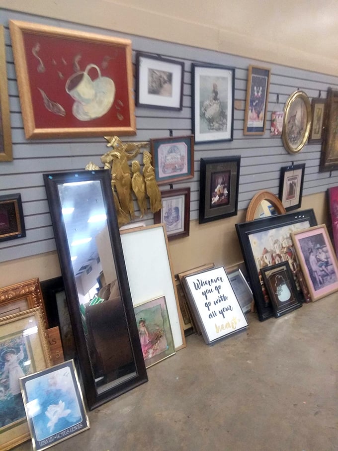 Wall art galore where framed treasures lean casually against each other &ndash; including that inspirational quote reminding you to "take your heart" wherever you go.