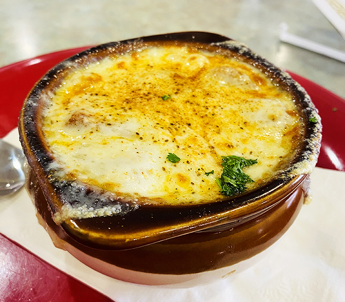 French onion soup that's achieved the perfect cheese-to-broth ratio &ndash; the culinary equivalent of hitting the lottery on your first try.