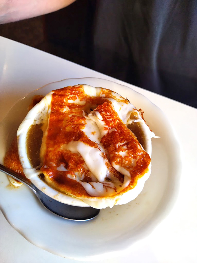 This isn't just soup&mdash;it's French onion therapy in a bowl, with a cheese cap that stretches like your favorite sweater.