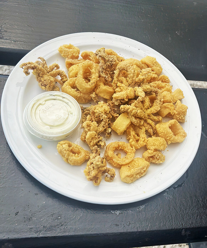 A mountain of golden fried calamari that shatters with each bite&mdash;the kind that makes you wonder why you ever share appetizers.