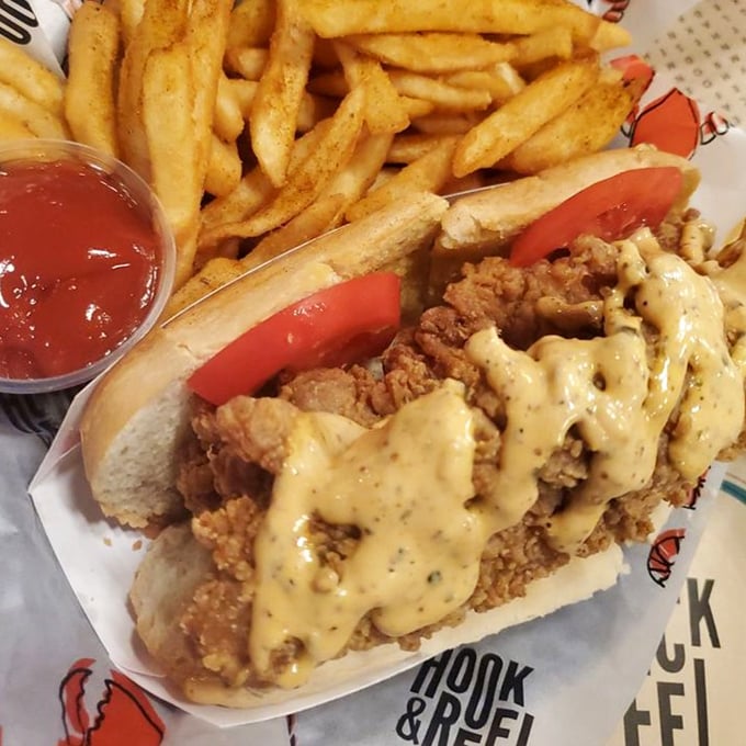 The po' boy sandwich: where crispy fried fish meets creamy sauce in a French bread embrace.