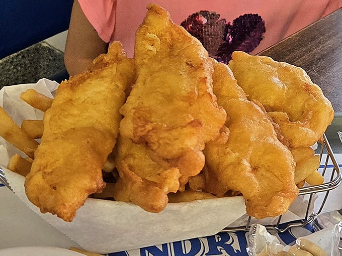 Fried halibut that achieves the impossible trifecta: golden exterior, flaky interior, and zero greasiness. The kind of dish that ruins all other fish forever.