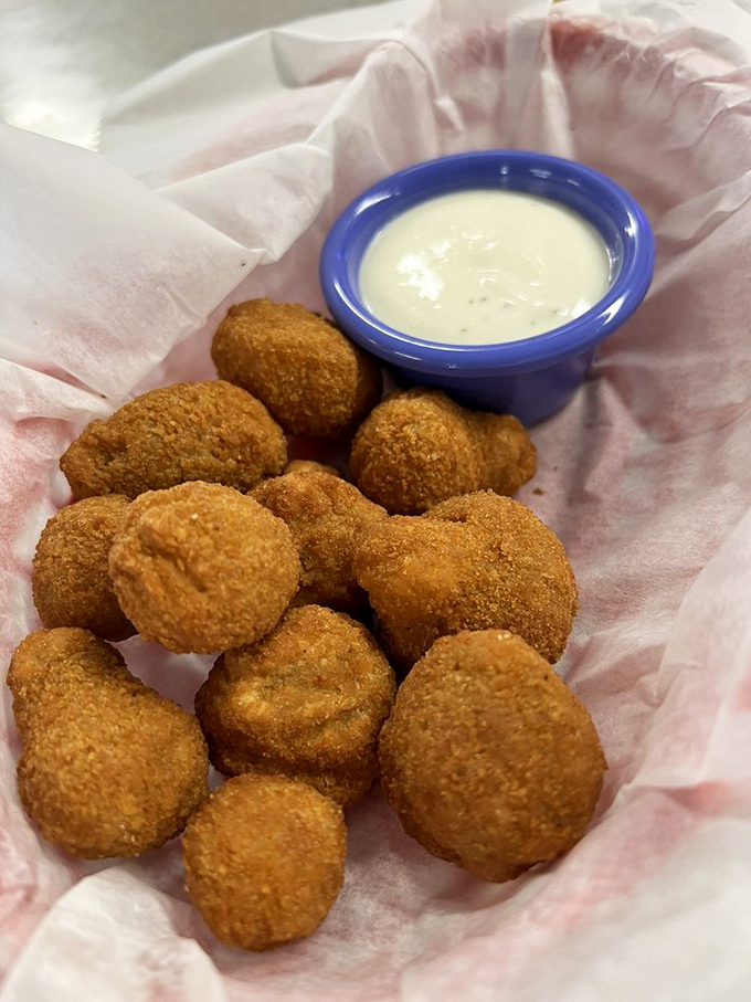 These golden-fried mushrooms aren't trying to be fancy—they're just trying to be delicious. Mission accomplished.