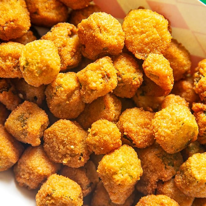 Fried okra with the kind of golden crust that makes fast food versions weep with inadequacy. No dinosaur shapes needed here.