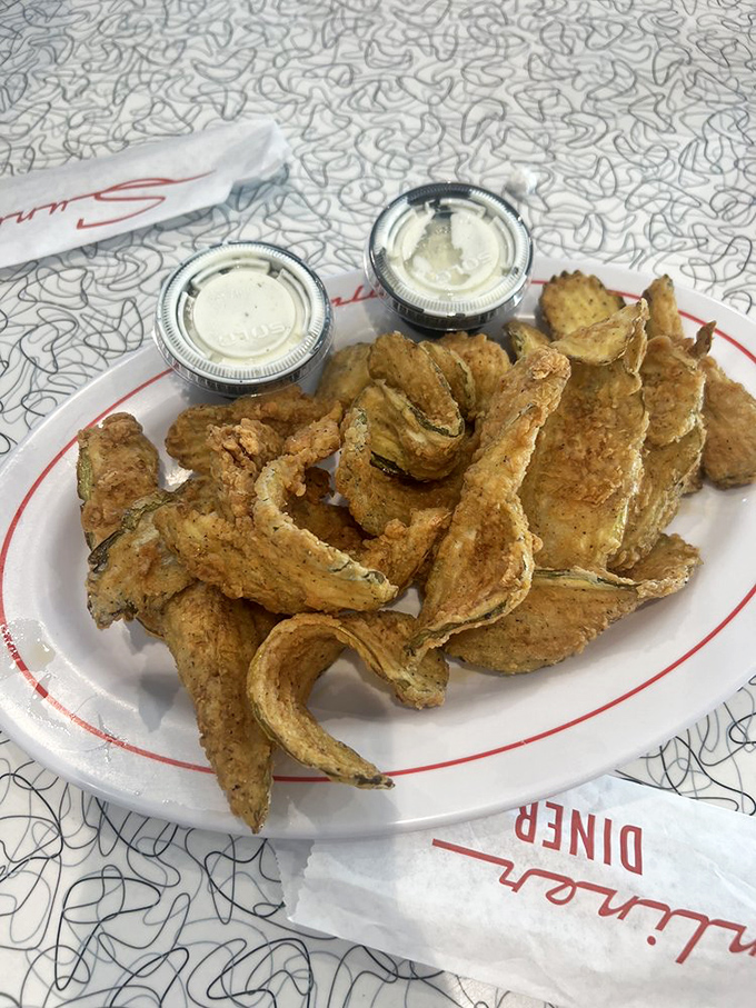 Fried pickles: proof that anything becomes magical when battered and fried to golden perfection. The South's greatest contribution to appetizer science.