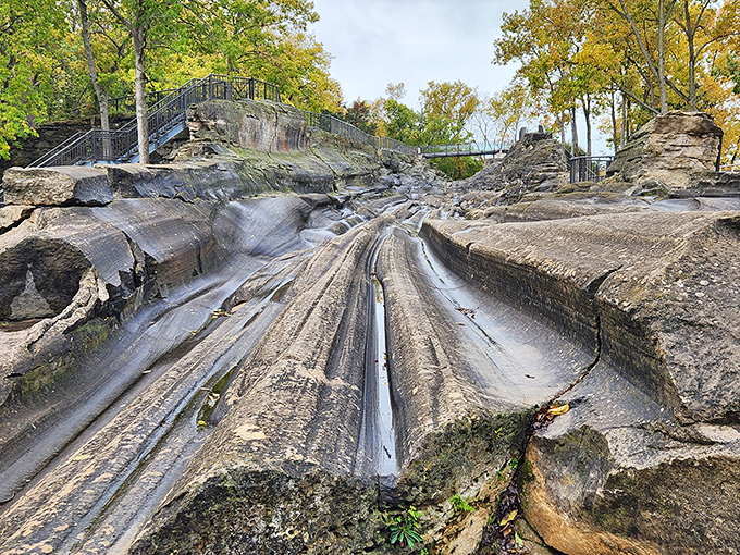 The famous Glacial Grooves &ndash; Mother Nature's own prehistoric art installation, carved by ice with the patience only geology can afford.