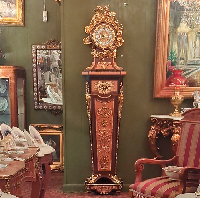 Time stands magnificently tall in this ornate grandfather clock. Imagine the conversations it could start in your entryway!