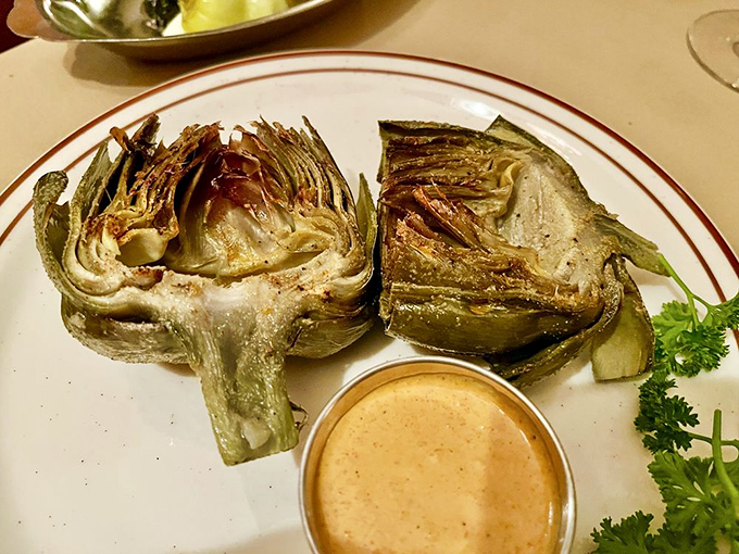 These grilled artichokes have clearly been living their best life over oak fire before meeting that smoky dipping sauce.