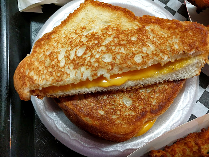 The humble grilled cheese, elevated to art form. That golden exterior promises the gooey, stretchy cheese pull that dreams are made of.