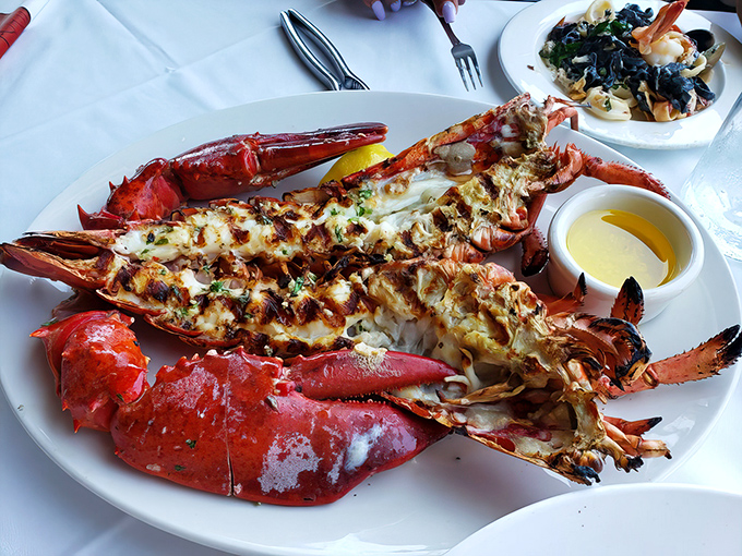 Split, grilled, and ready for its close-up. This lobster has been given the California treatment &ndash; kissed by flame and dressed with herbs.