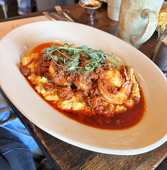 Shrimp and grits elevated to art form&mdash;the kind of dish that makes you pause mid-conversation and point wordlessly at your plate.