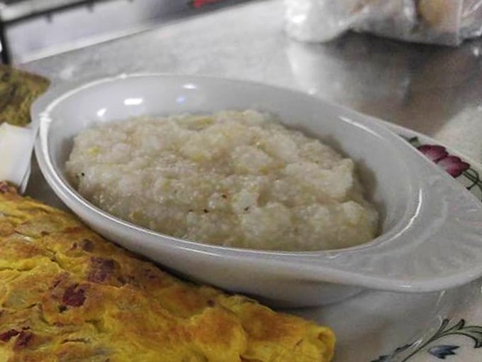 Grits so creamy and comforting they could end international conflicts. Southern comfort in a bowl that whispers, "Honey, everything's gonna be alright."