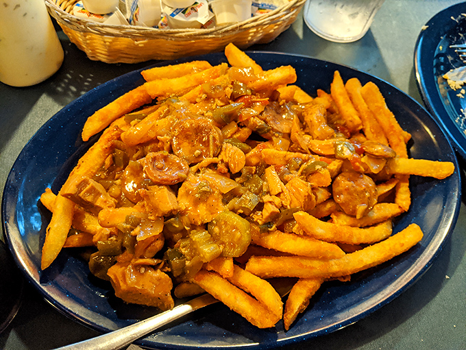 Gumbo fries: where French culinary tradition meets Gulf Coast ingenuity. Whoever thought of this deserves a Nobel Prize in Deliciousness.
