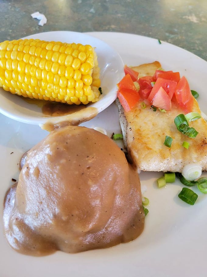 In Alaska, even the fish comes with a side of comfort. This halibut steak with fresh corn proves seafood doesn't have to be fancy to be magnificent.