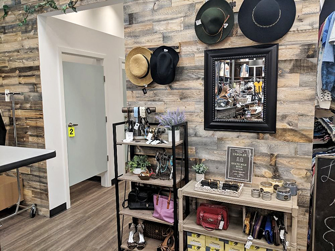 The accent wall that fashion dreams are made of. Vintage-inspired hats and rustic wood paneling create the perfect Instagram backdrop for your thrifting adventures.
